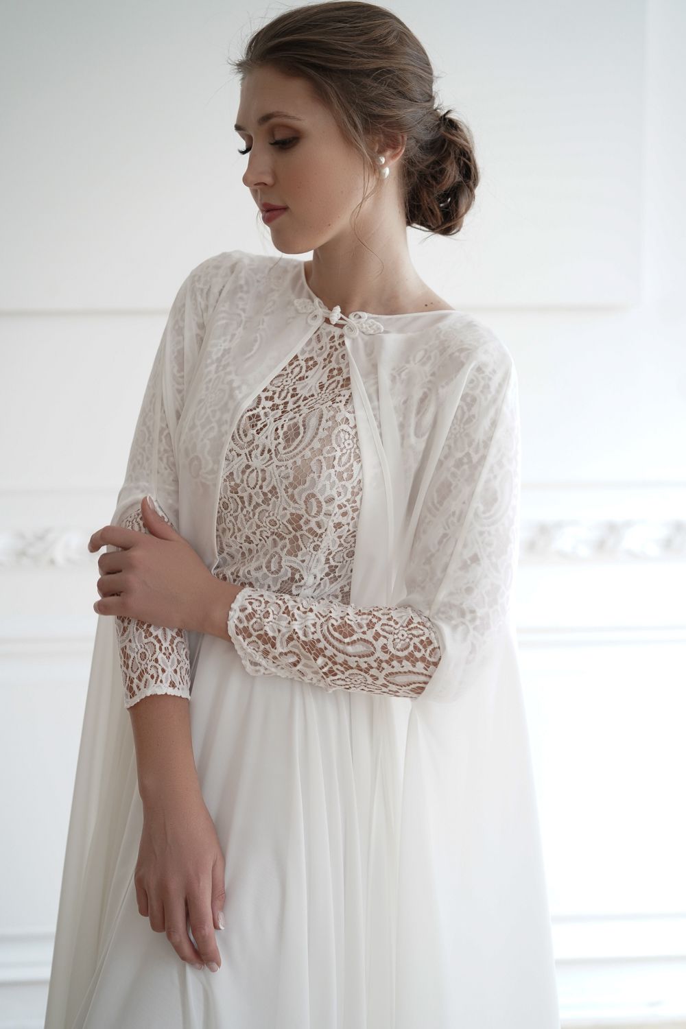 Cape with slits for hands